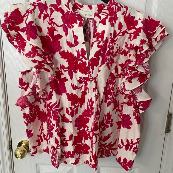 Avara | Tops | Chic Pink And Red Floral Blouse With Ruffle Details ...